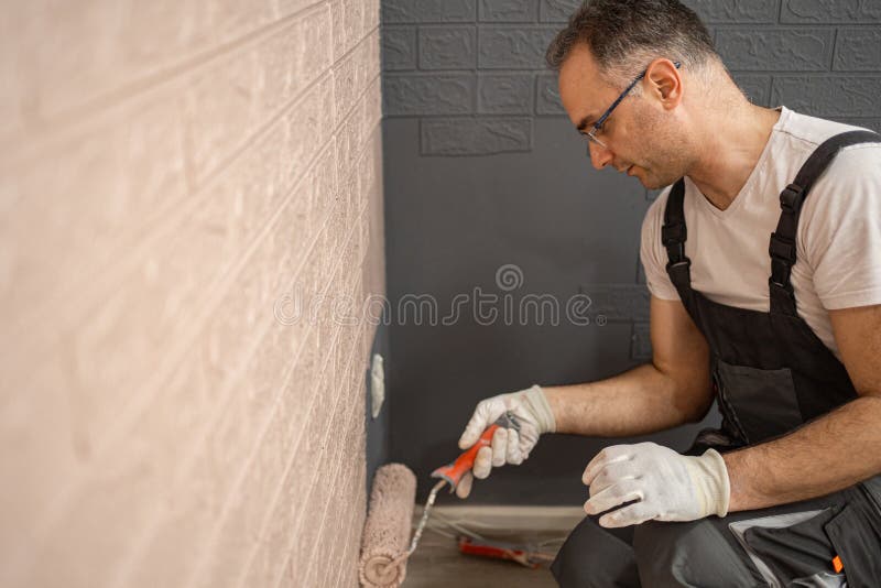 Man Painting Wall with Paint Roller Stock Image - Image of wall, room ...
