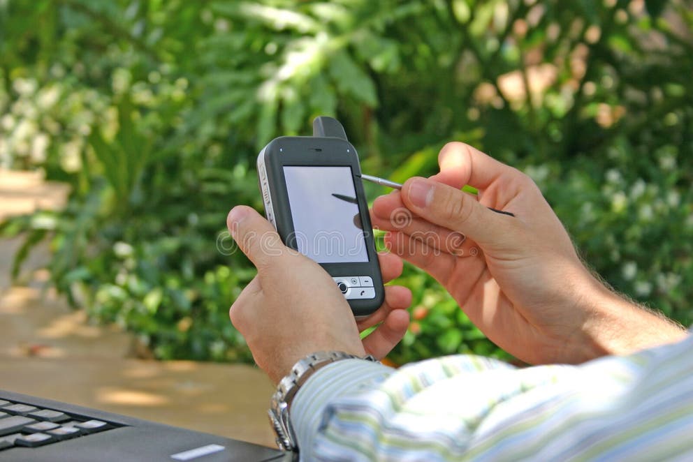 Man Using PDA / Smartphone Outside Stock Photo - Image of small, modern ...