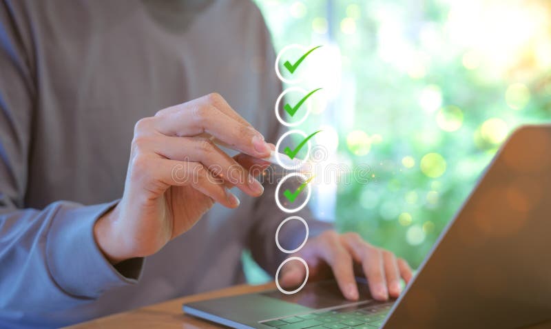 Man Using Pen To Tick Correct Sign Mark in Checkbox for Quality ...