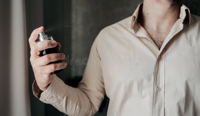 Man using perfume stock image. Image of sale, casual - 245192501