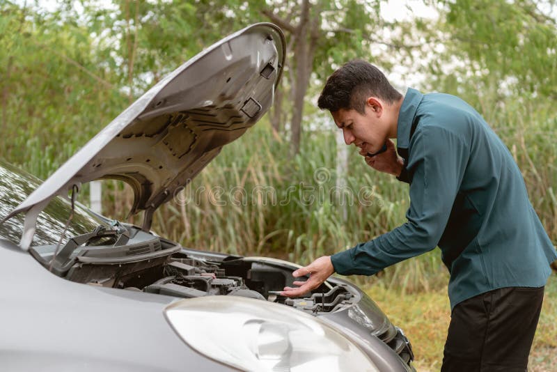 Man Using Phone for Contact Maintenance Car Service. Car Broken Concept ...