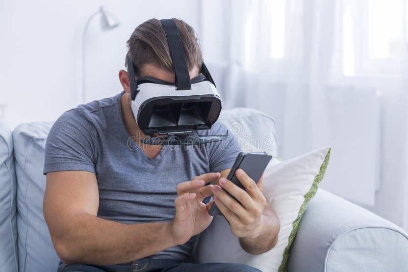 Man Using a Phone with VR Goggles Stock Image - Image of virtual ...