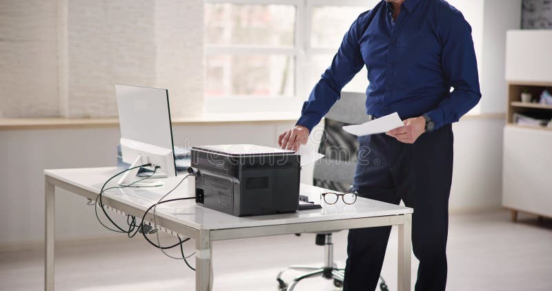 Man Using Photocopy Machine in Office Stock Photo - Image of mature ...