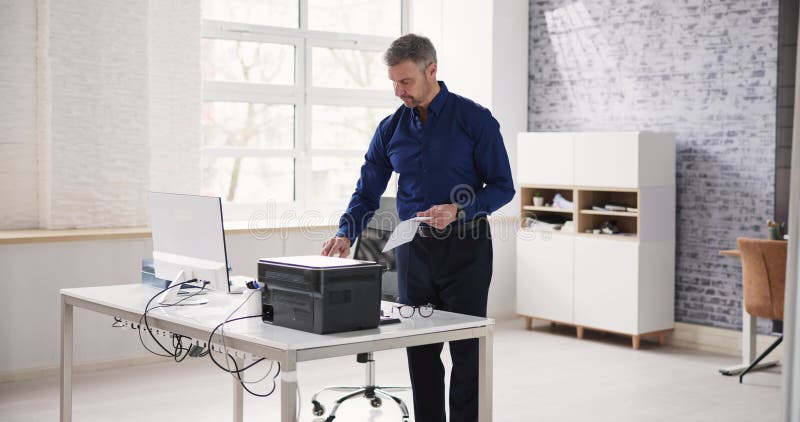 Man Using Photocopy Machine in Office Stock Photo - Image of laser ...