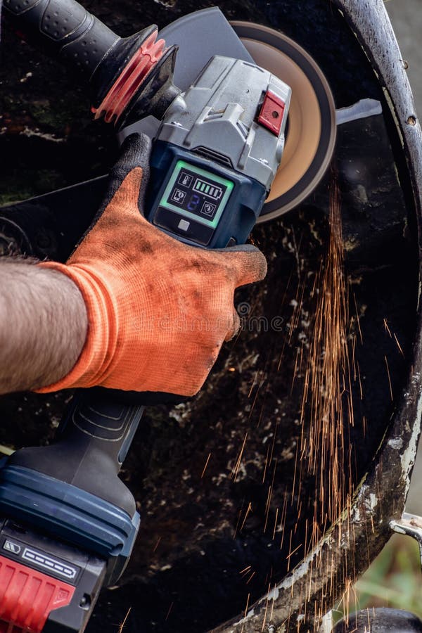 Man Using Portable Grinder with Sparkles Stock Image - Image of iron ...