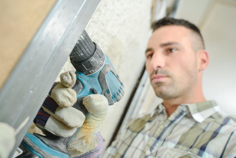 Man using power drill stock photo. Image of electrical - 123020536