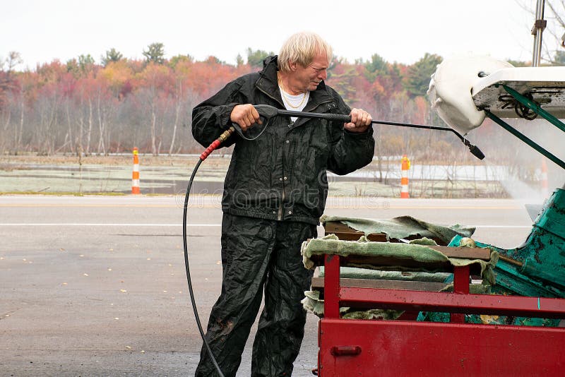 Man using power washer stock photo. Image of dirt, nautical - 199422842