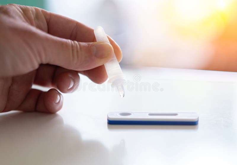Man Using a Rapid Antigen Test Kit. Rapid Antigen Testing is a ...