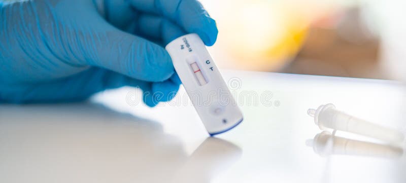 Man Using a Rapid Antigen Test Kit. Rapid Antigen Testing is a ...