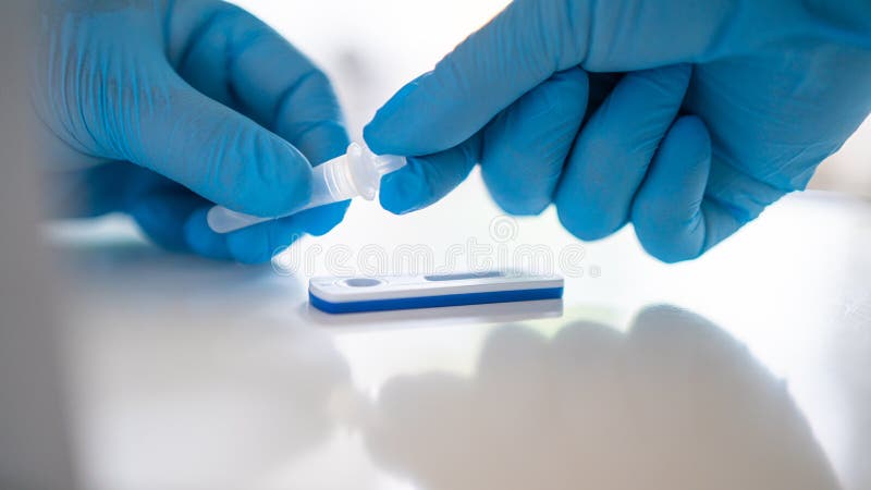 Man Using a Rapid Antigen Test Kit. Rapid Antigen Testing is a ...
