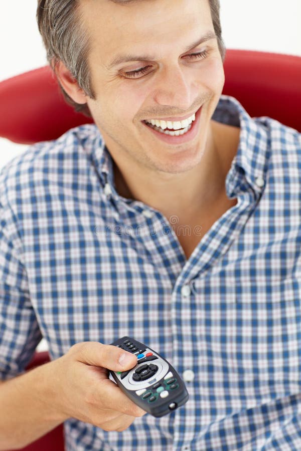 Man Using Remote Control stock image. Image of player - 21288283