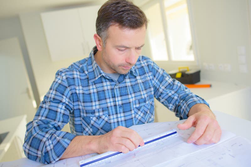 Man using scale ruler stock photo. Image of office, measurements ...