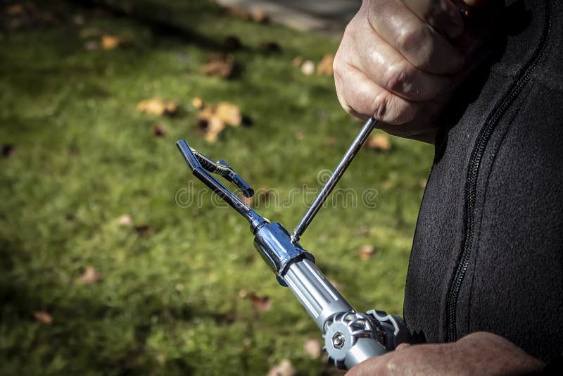 Screwdriver with Long Sleeve Stock Photo - Image of machine, weapon ...