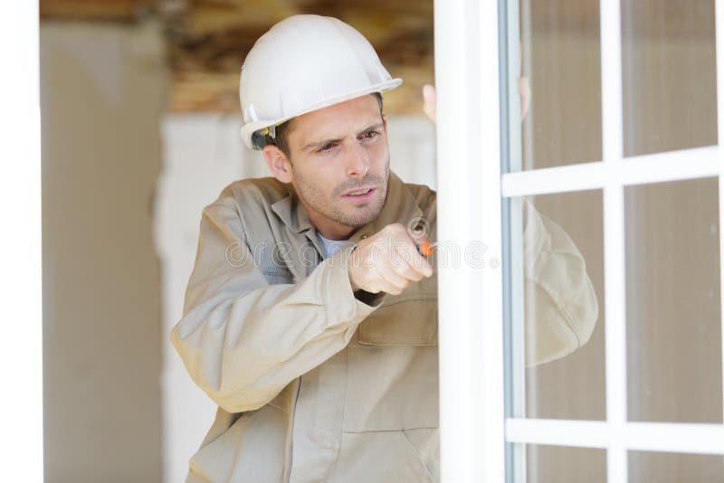 Man Using Screwdriver on Window Stock Image - Image of protection ...