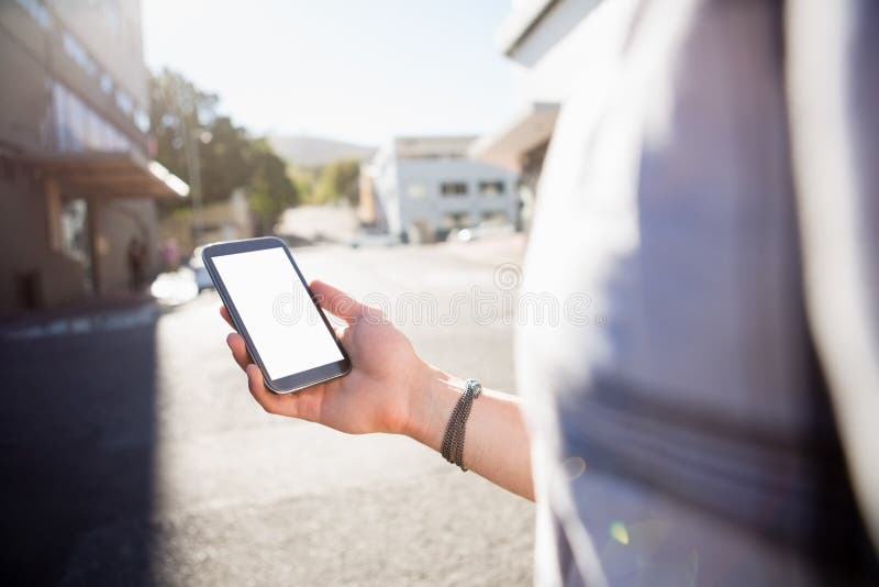 Man Using Smart Phone while Standing on City Street Stock Photo - Image ...