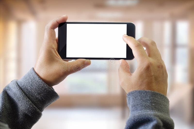 Man Using Smart Phone On Window With City Building Background Stock ...