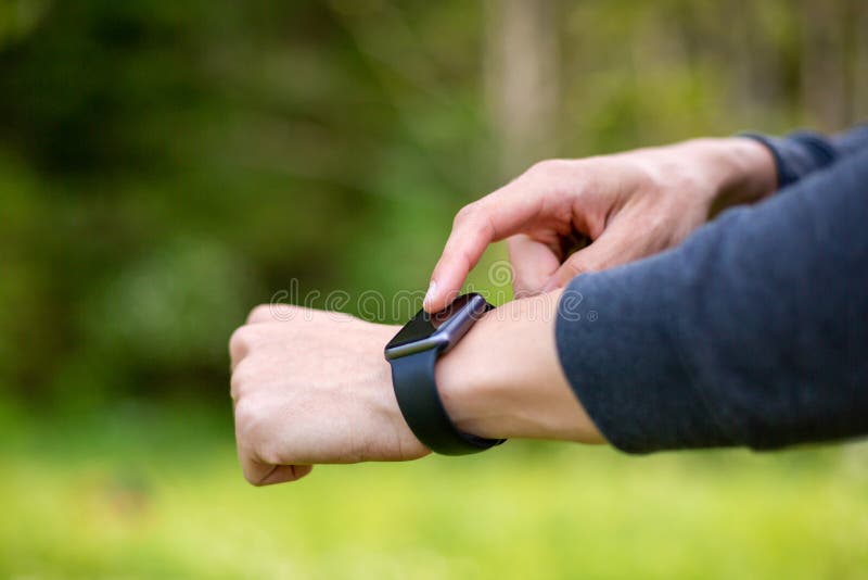 Man using smart watch stock image. Image of concept - 179298073