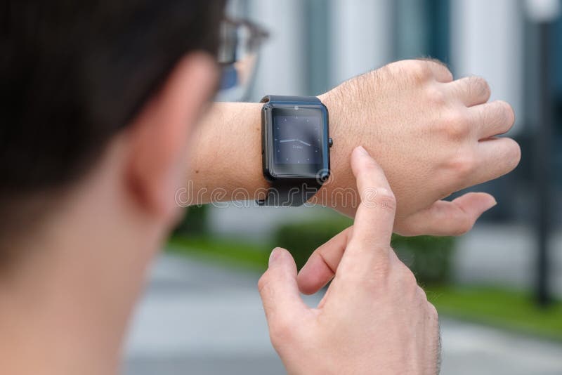 Man using smart watch stock photo. Image of hand, person - 75925032