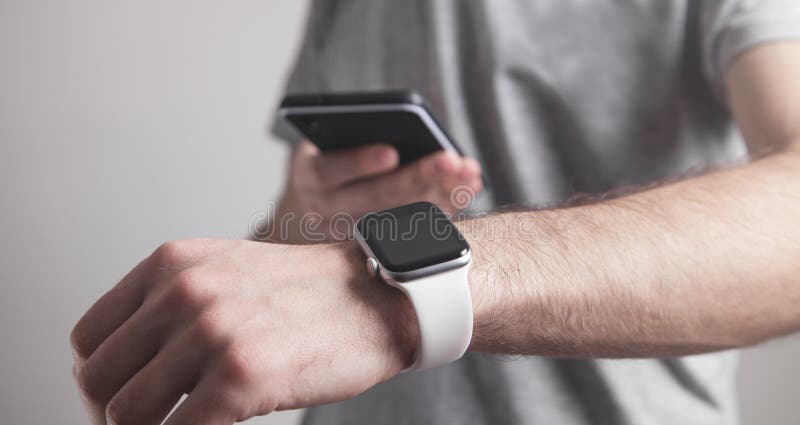 Man Using Smart Watch and Smartphone. Lifestyle Stock Photo - Image of ...