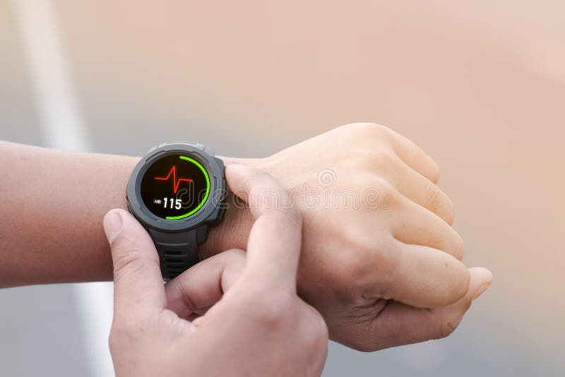 A Man Using Smart Watch for Tracking Running Stock Photo - Image of ...