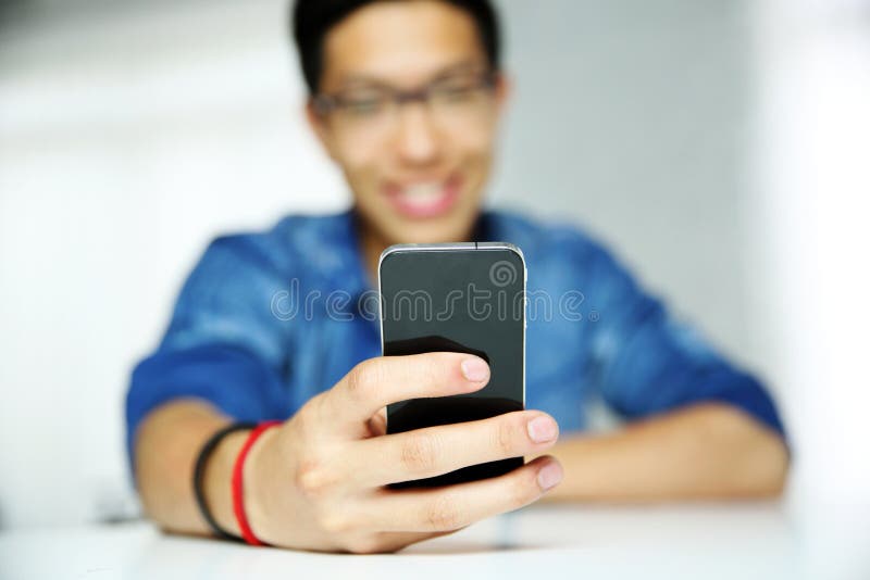 Man using smartphone. stock image. Image of hand, desk - 41053943