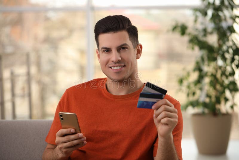 Man Using Smartphone and Credit Card for Online Payment Stock Image ...