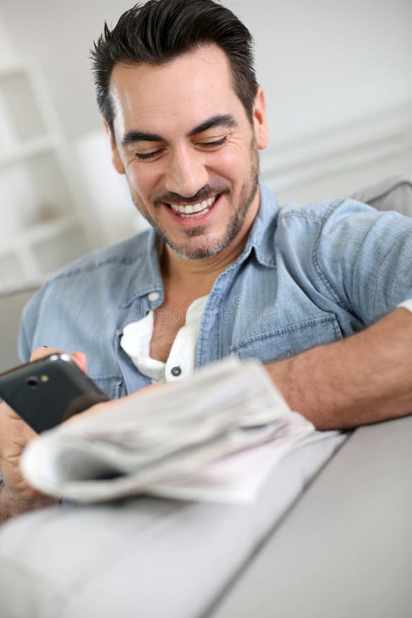 Man Using Smartphone at Home Stock Image - Image of android, trendy ...