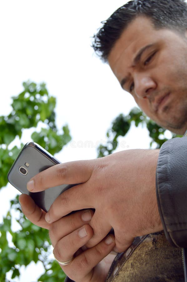 Man using smartphone stock image. Image of communication - 50073181