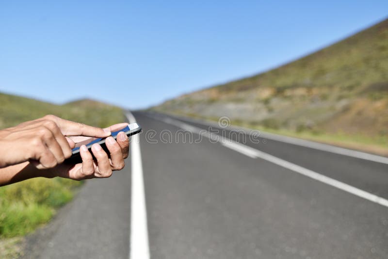 Man Using a Smartphone Next To the Road Stock Image - Image of place ...