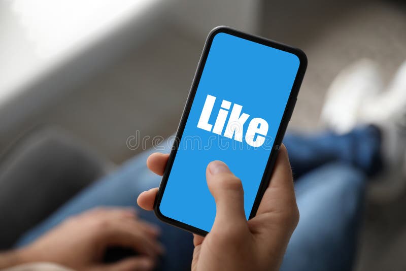 Man Using Smartphone with Word Like on Screen, Closeup Stock Image ...