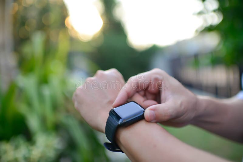 Man Using Smartwatch Touching Button and Touchscreen on Active Sports ...