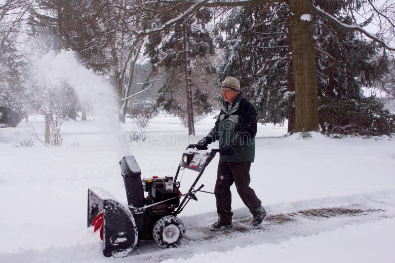 Snowblower Man Blowing Snow Away from Viewer Stock Photo - Image of ...