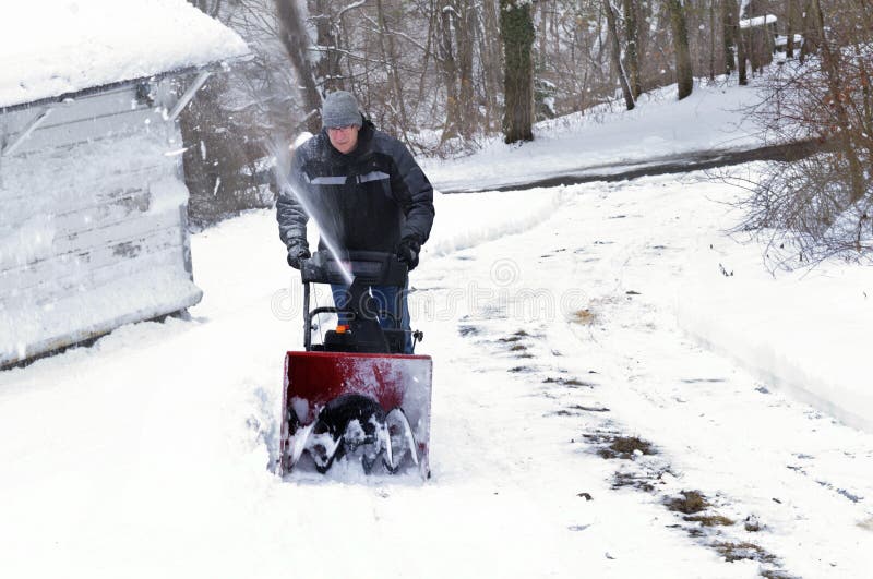 Man using Snowblower stock photo. Image of storm, blower - 49391634