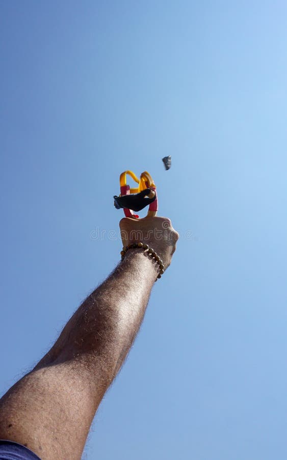 Man Using Spear Thrower Throwing Rock Nature Amusement Stock Photo ...