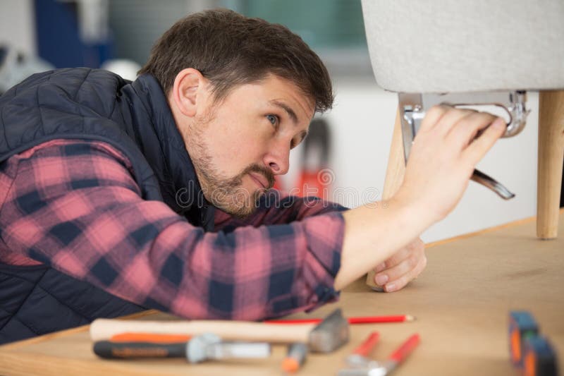 Man Using Staple Gun for Crafts Project Stock Image - Image of activity ...