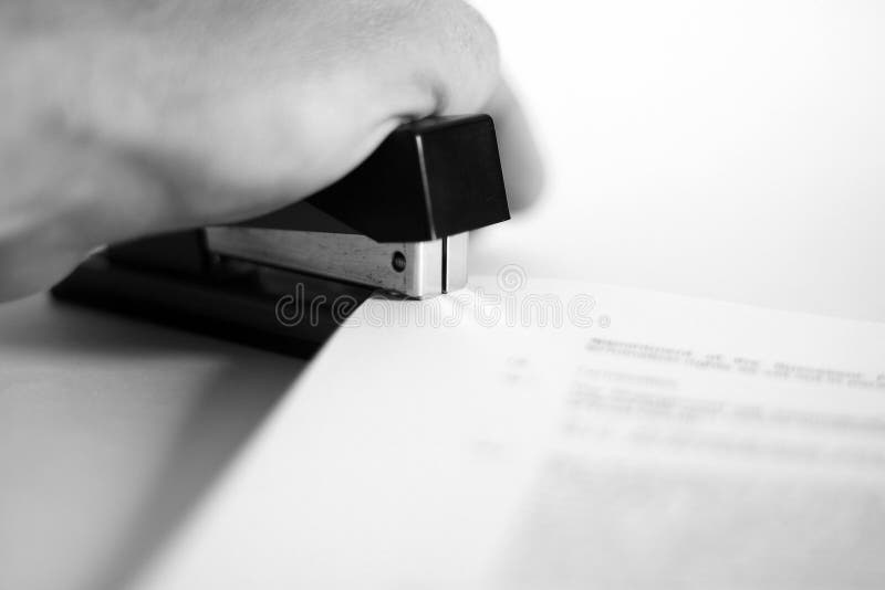 Man using stapler C stock image. Image of document, stapler - 41215555