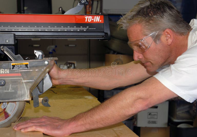 Man using table saw stock photo. Image of middle, work - 13678440