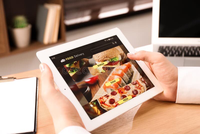 Man Using Tablet for Ordering Food Online at Work, Closeup. Concept of ...