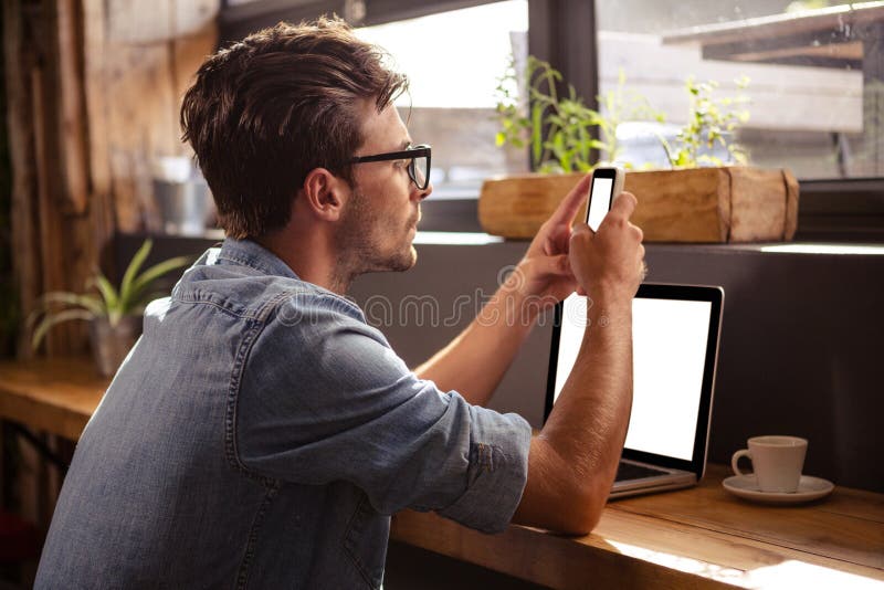 Man Using Technology Sitting Stock Photo - Image of clothing, laptop ...