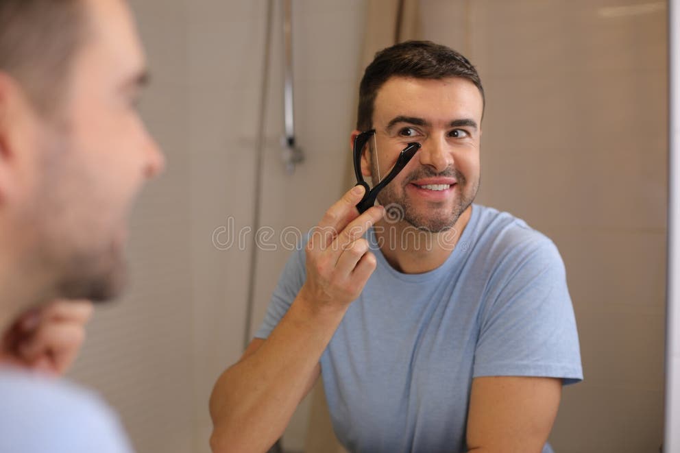 Man Using Threading As a Method for Hair Removal Stock Photo - Image of ...