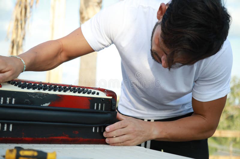 Man Using Tool To Fix and Tune Accordion Stock Image - Image of ...