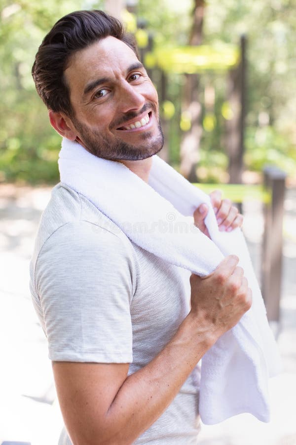 Man Using Towel Resting after Run in Park Stock Image - Image of ...