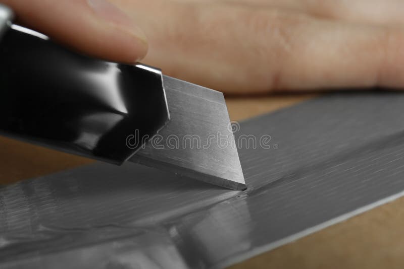 Man Using Utility Knife To Open Parcel, Closeup Stock Photo - Image of ...