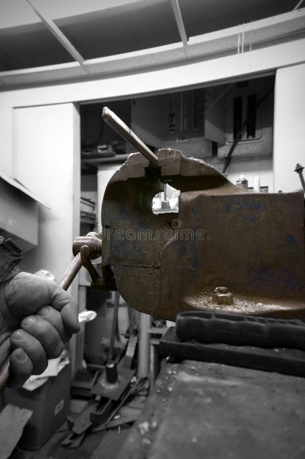 Man Using a Vice in a Workshop. Stock Photo - Image of construction ...