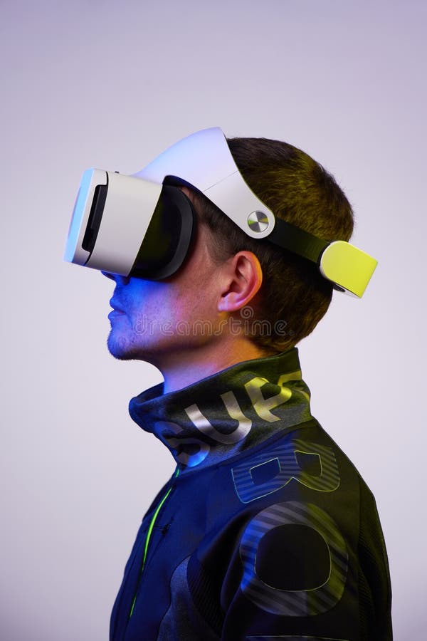Man is Using Virtual Reality Headset. Concept of Virtual, Augmented and ...