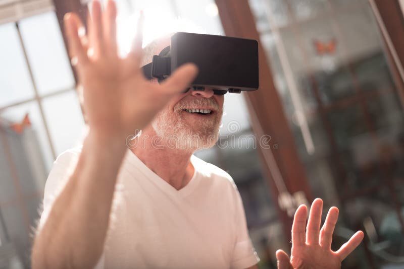 Man Using a Virtual Reality Headset, Hard Light Effect Stock Photo ...