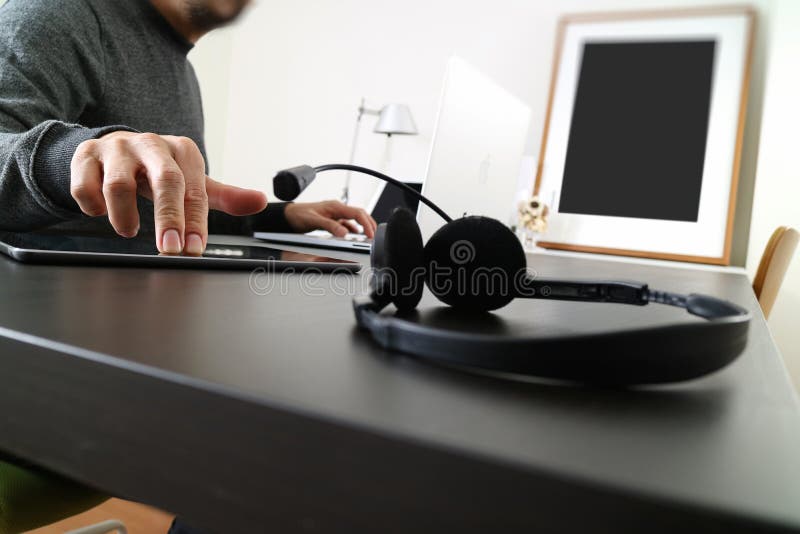Man Using VOIP Headset with Digital Tablet Computer As Concept C Stock ...