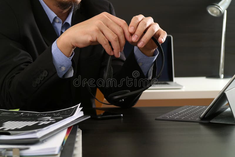 Man Using VOIP Headset with Digital Tablet Computer As Concept C Stock ...