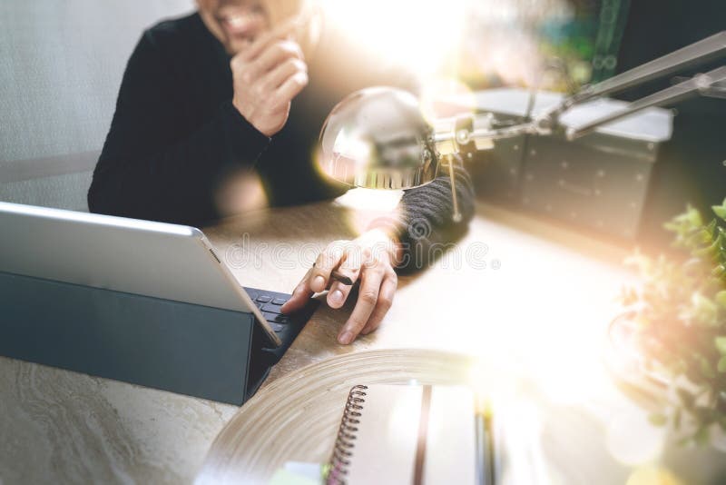Man Using VOIP Headset with Digital Tablet Computer Docking Smart ...