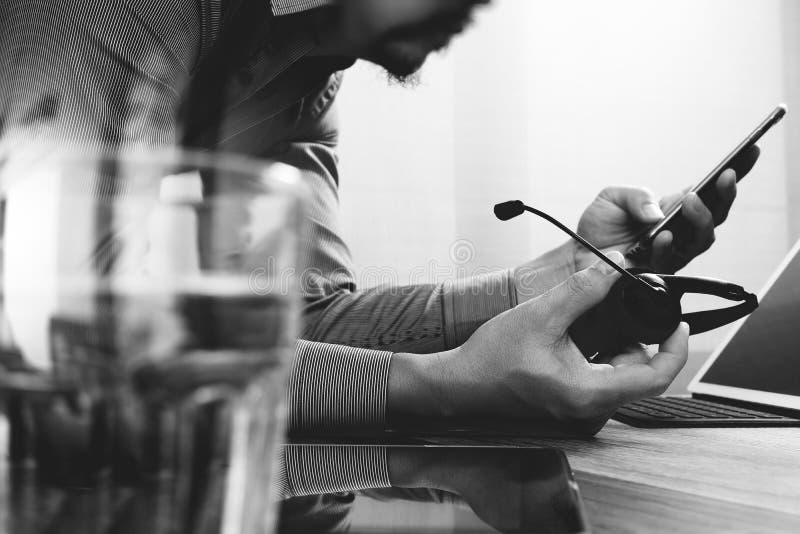 Man Using VOIP Headset with Digital Tablet Computer Docking Smart ...
